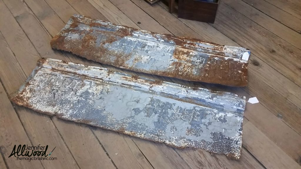 We made a repurposed cornice board from old rusty tin panels!